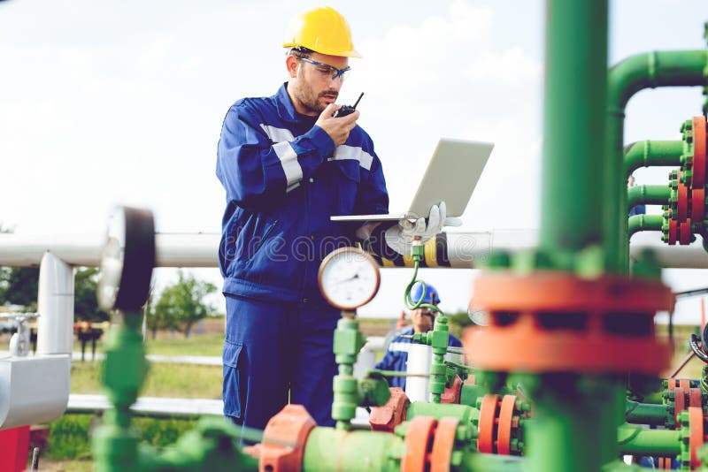 Operator Recording Operation Of Oil And Gas Process At Oil And Rig ...