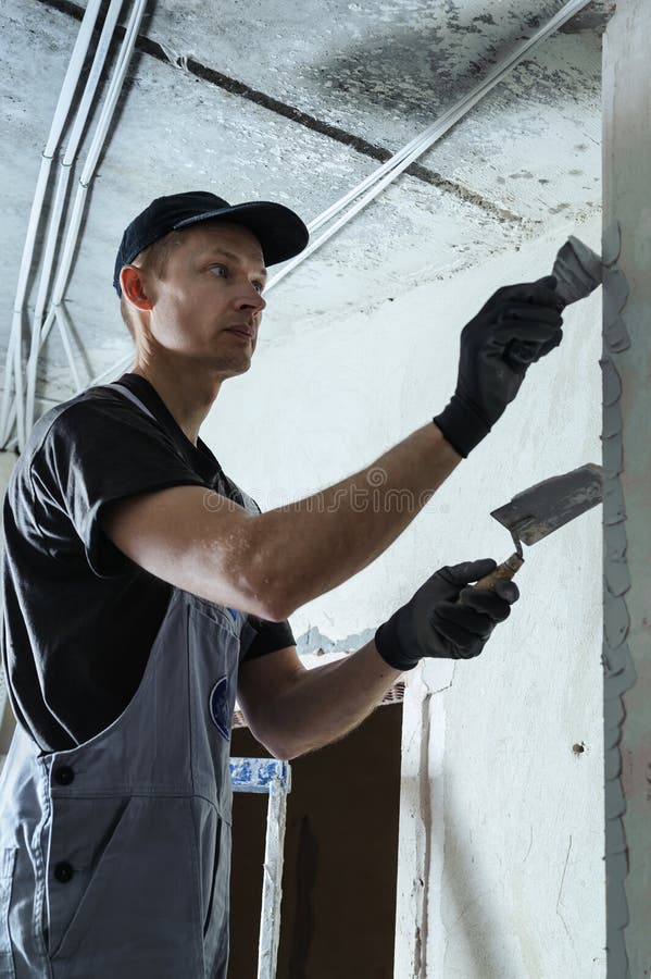 Worker Gets Plaster on the Wall Stock Image - Image of trowel ...