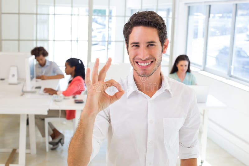 Worker Giving an OK Gesture Stock Image - Image of office, female: 40687477