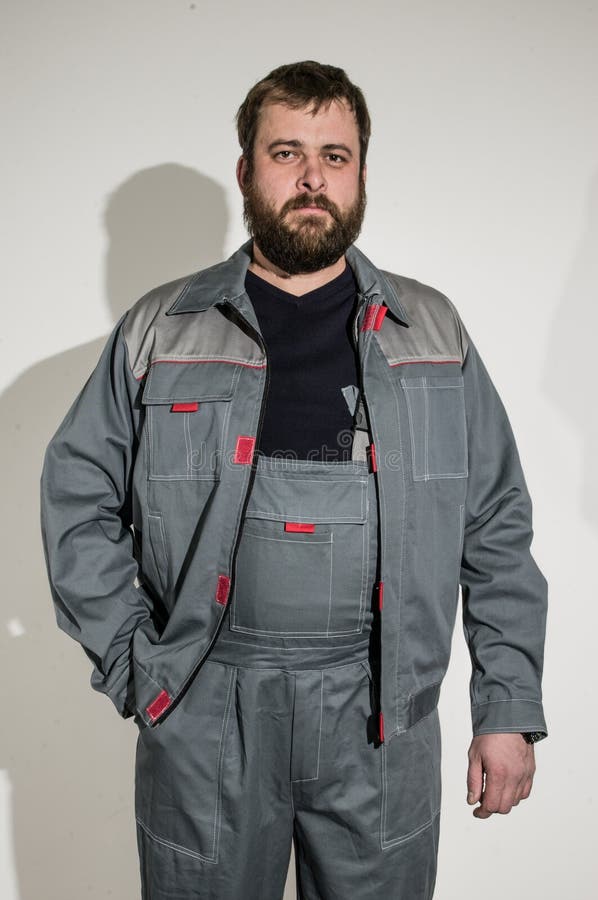 Worker in the Grey Overalls Stock Photo - Image of grey, repairer: 84584670
