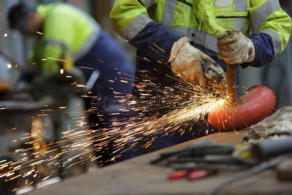 Worker Grinding Cutting Metal Sheet with Grinder Machine Stock Photo ...