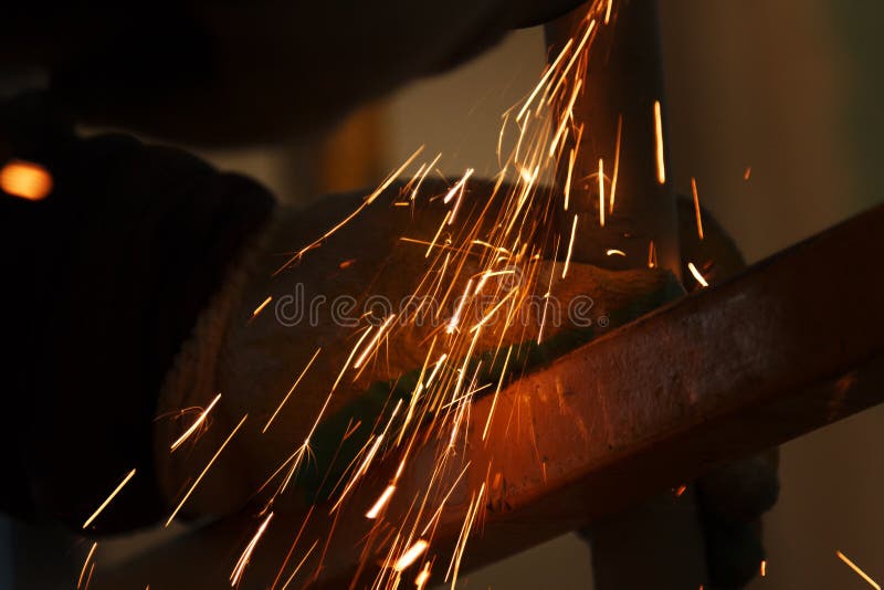Worker Grinding Cutting Metal Sheet with Grinder Machine and Sparks ...