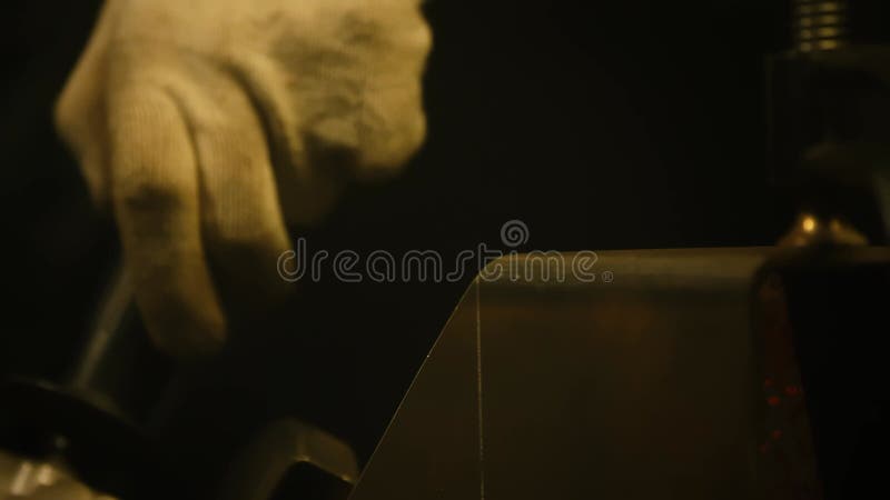 Worker Grinding Iron. Heavy Industry Factory Interior with Worker Using ...