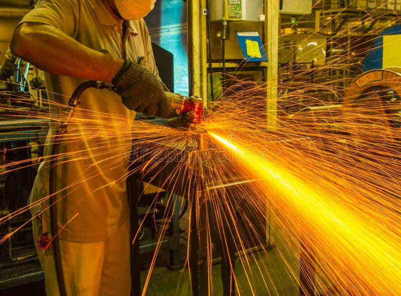 The worker grinding metal stock photo. Image of fabricate - 68210144