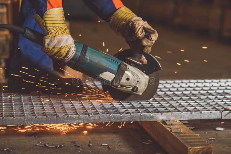 Worker Grinding a Metal Plate Stock Image - Image of round, macro: 66251873