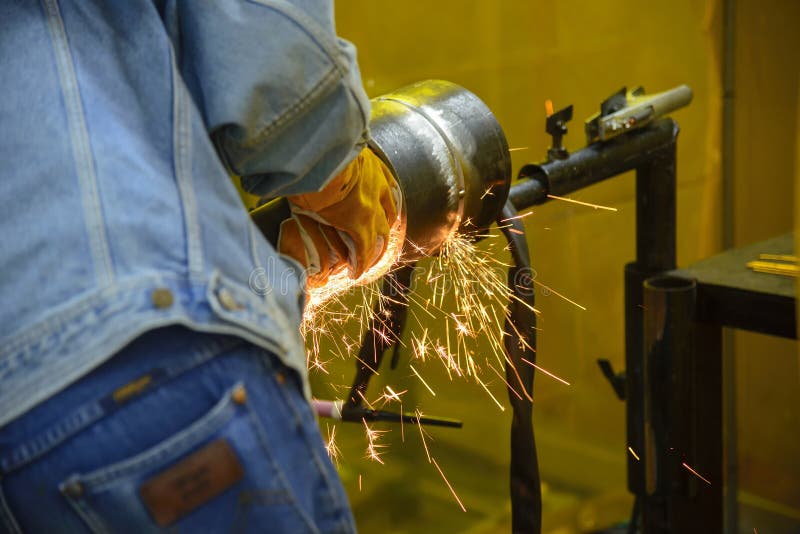 The Worker Grinding the Steel Pipe Stock Photo - Image of equipment ...