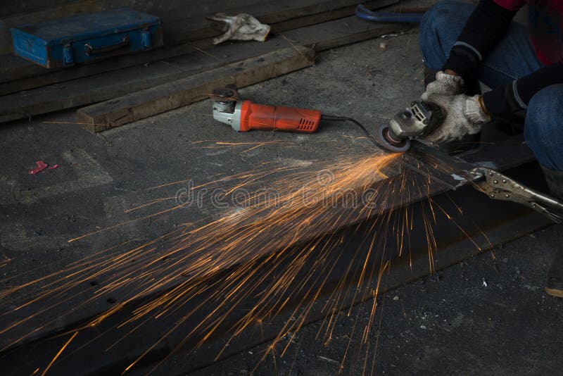 Worker grinding steel stock photo. Image of skilled, bright - 32499950