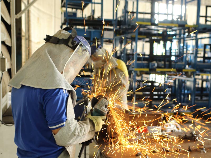 Man at work grinding steel stock image. Image of craft - 18204559