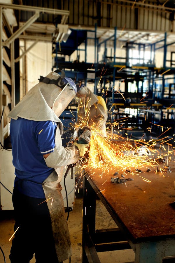 Worker grinding steel stock image. Image of hand, iron - 61259085
