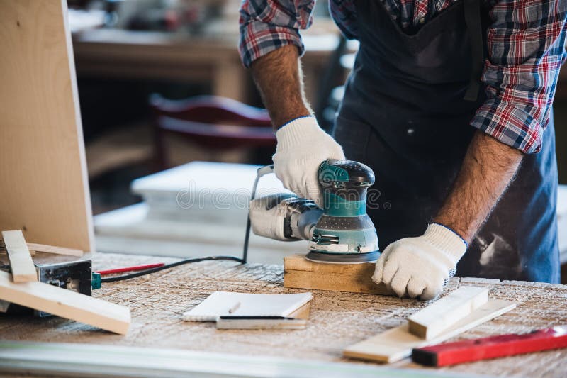 Worker Grinds the Wood of Angular Grinding Machine Stock Photo - Image ...