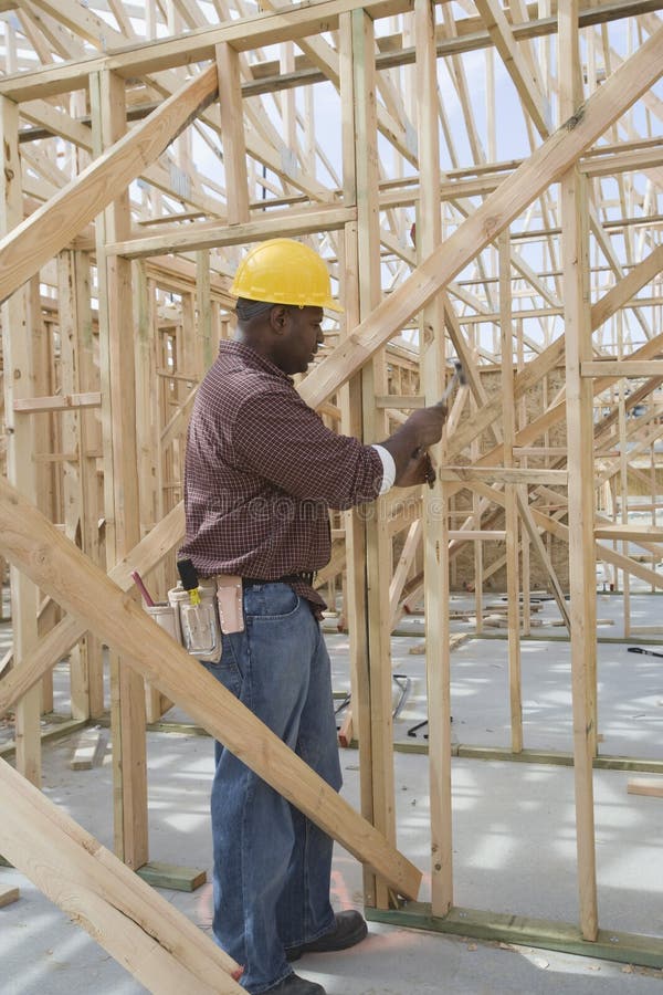 Worker Hammering on House Frame Stock Image - Image of architectural ...