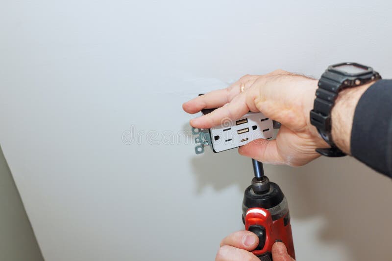 Individual Installing Electrical Outlet Cover in Residential Space ...