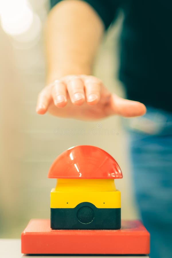 Hand pressing red buzzer stock photo. Image of plastic - 62815880
