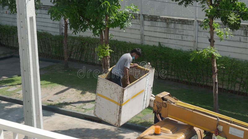 Worker on Height Lifting Platform Installing New Street Light Bulb ...