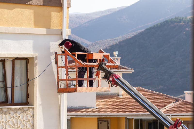 Worker without Helmet Repairing Water Pipe on Crane Stock Image - Image ...