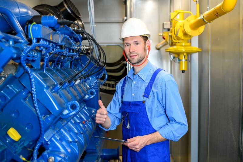 Worker with Helmet Working on Big Generator Showing Thumb Up Stock ...