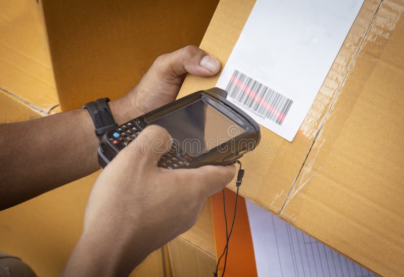 Worker Holding Barcode Scanner Scanning Red Laser on Parcel Box ...