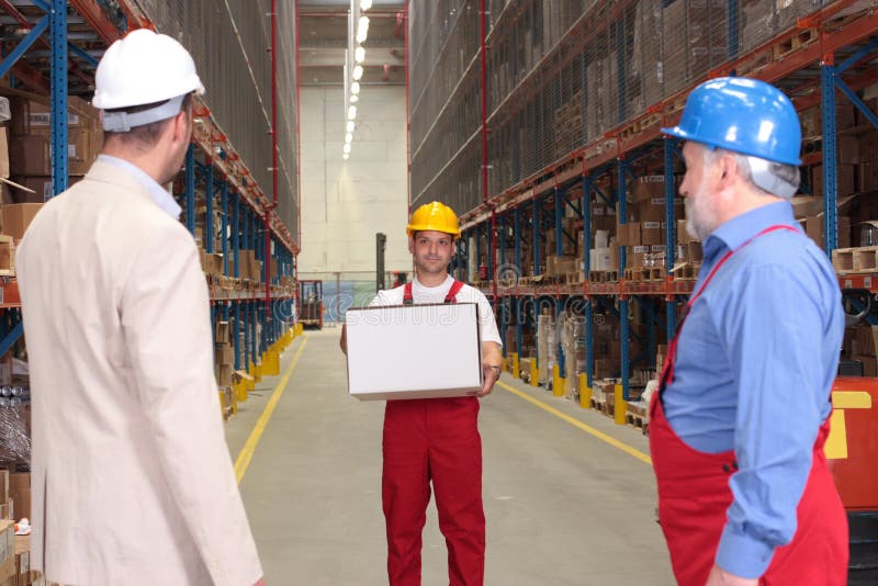 Worker Holding Box in Warehouse Stock Image - Image of experience ...