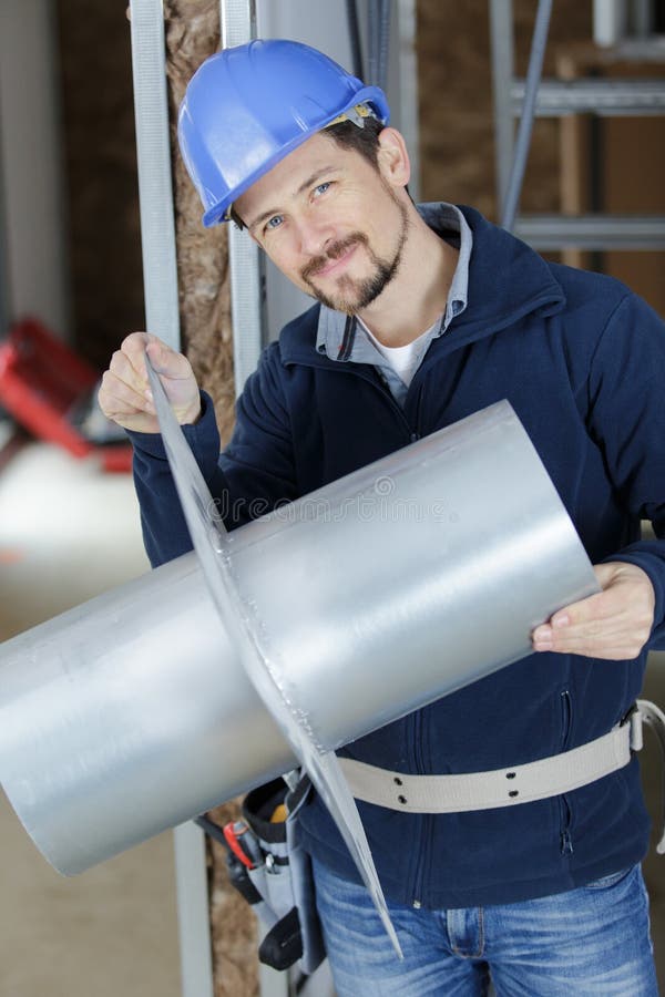 Worker Holding Plastic Pipe Stock Photo - Image of professional ...