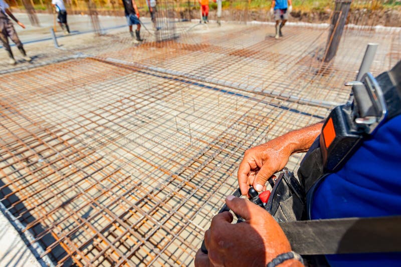 Worker is Holding Remote, Wireless, Control for Concrete Pump at ...