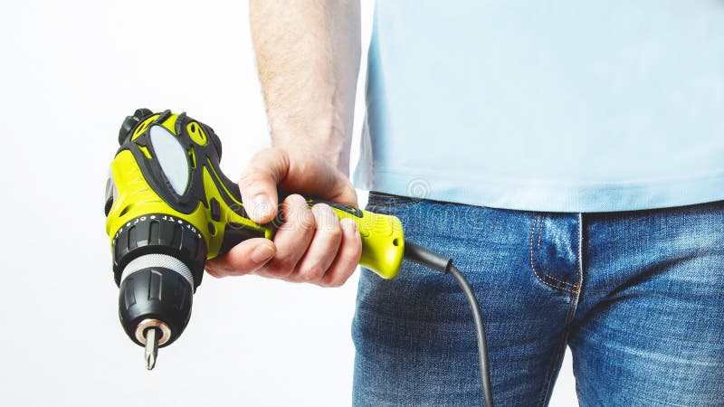 Worker holding screwdriver stock photo. Image of repair - 212046440