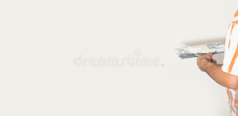 Worker Holding Spatula on a Wall. Renovation Stock Image - Image of ...