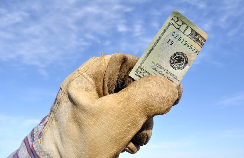 Worker Holding a Twenty Dollar Bill Stock Image - Image of fingers ...