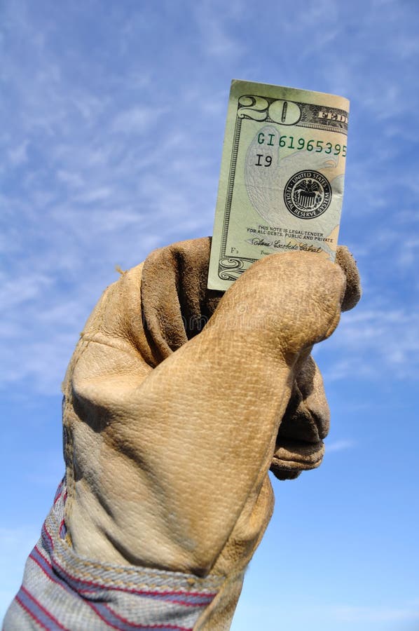 Worker Holding a Twenty Dollar Bill Stock Image - Image of hand, grasp ...