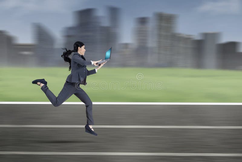 Worker Holds Laptop and Runs on Track Stock Image - Image of girl ...