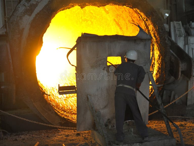 Worker with hot steel stock photo. Image of metalcasting - 18118710
