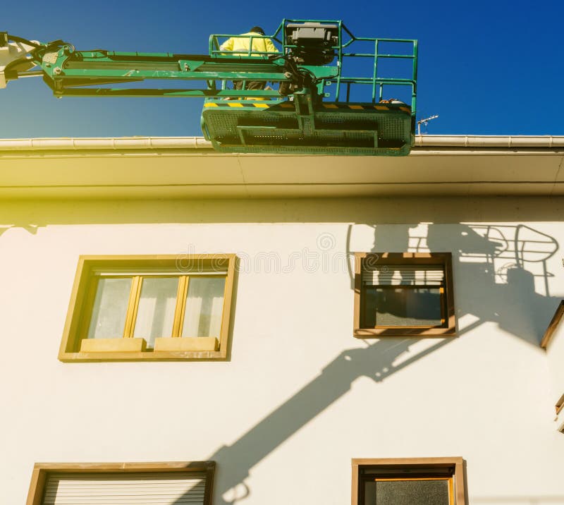 Worker on Hydraulic Platform Stock Photo - Image of elevator, assembly ...