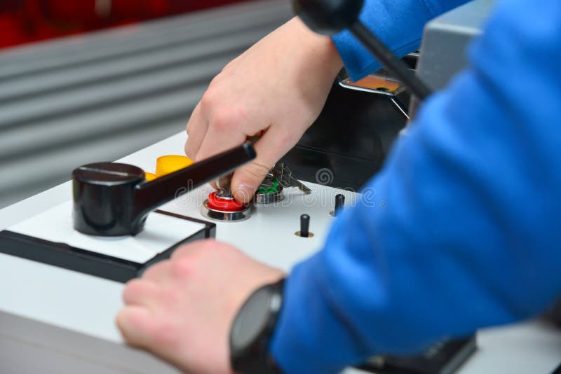The Worker Includes a Mechanical Machine Control Panel Stock Image ...