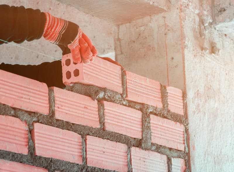 Worker Industrial Bricklayer Installing Laying Brick Inside And ...