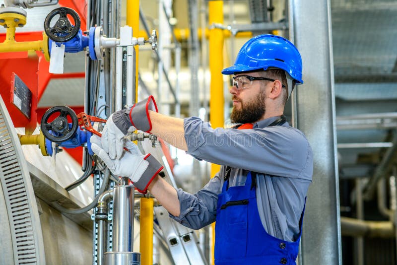 Worker in industrial plant stock photo. Image of business - 148686752