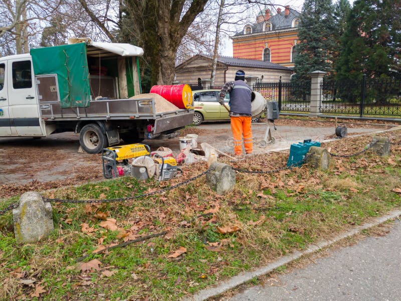 Road Maintenance Worker Makes Concrete Editorial Photo - Image of ...