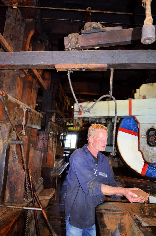Worker inside a windmill editorial photography. Image of historic ...