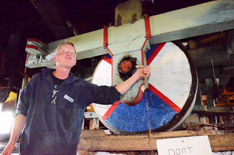 Worker inside a windmill editorial photography. Image of wood - 91825432