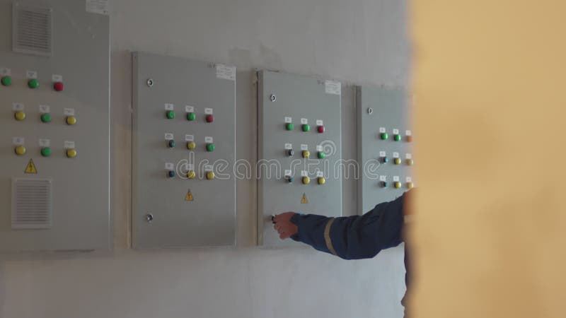 Worker Inspects Open Electrical Panel and Closes Using Key Stock Video ...