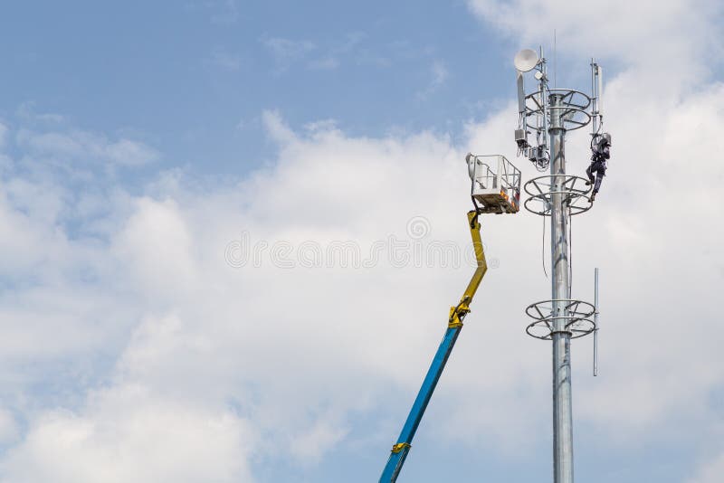 Worker Installing Antenna on Tall Telecommunication Tower Stock Photo ...