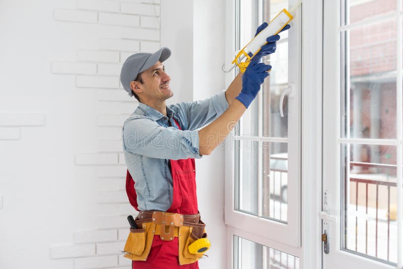 The Worker Installing and Checking Window in the House Stock Image ...