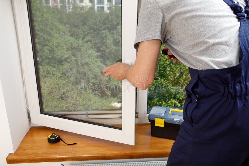 The Worker Installing and Checking Window in the House Stock Image ...