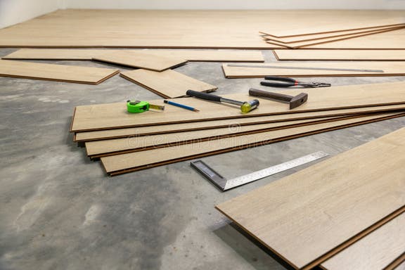 Worker Installing Interlocking Laminate Floor, Home Renovation Stock ...