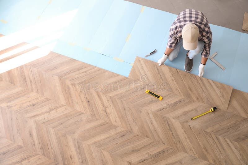 Worker Installing Laminated Wooden Floor Indoors, Above View Stock ...