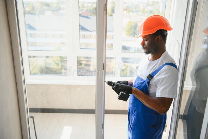 Worker Installing Plastic Window Indoors Stock Photo - Image of modern ...