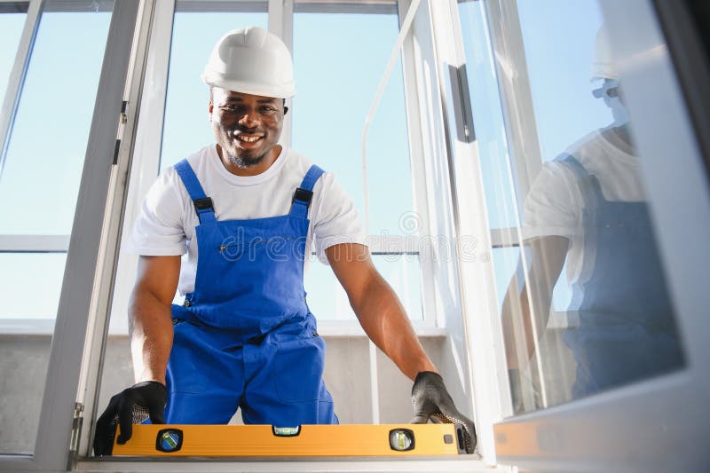 Worker Installing Plastic Window Indoors Stock Photo - Image of modern ...