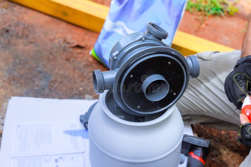 Worker Installing Sand Filter System Tank a Equipment for Cleaning ...