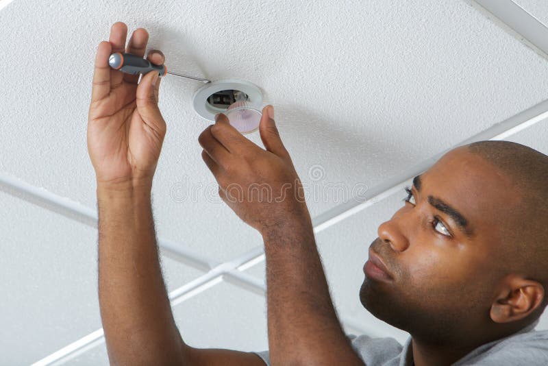 Worker Installing Smoke Detector in Room Stock Photo - Image of ...