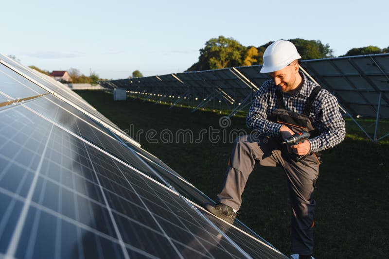 Worker Installing Solar Panels Outdoors Stock Photo - Image of ...