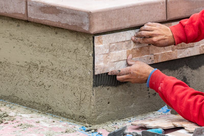 Worker Installing Wall Tile at Construction Site Stock Image - Image of ...