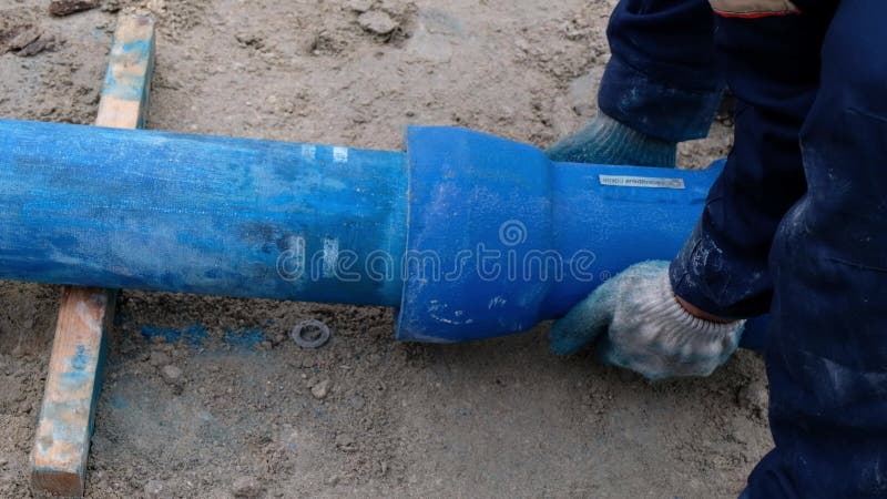 Worker Installing Water Supply Pipeline System Stock Video - Video of ...